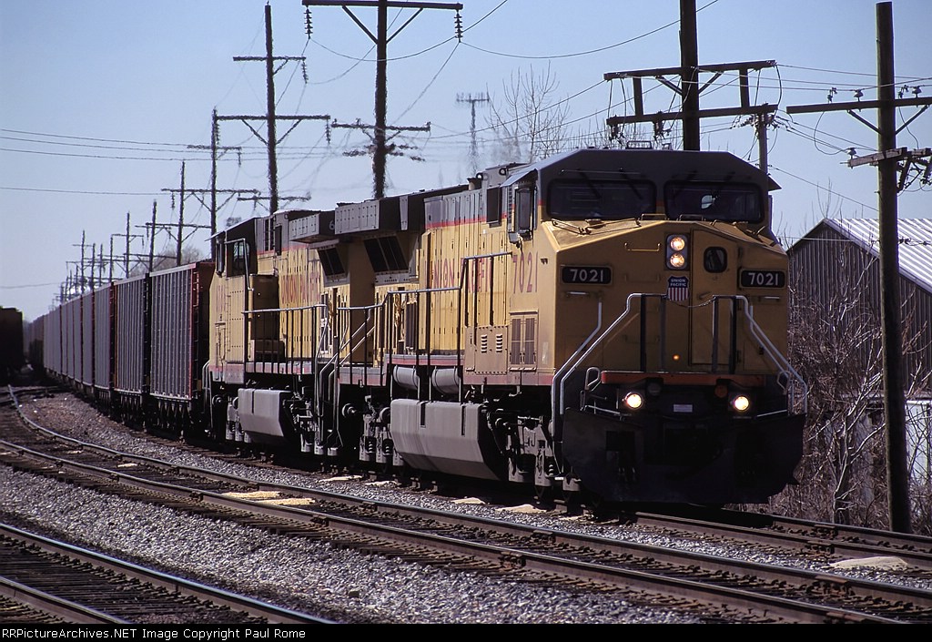 UP 7021, GE AC4460CW Convertible, working eastbound coal loads on the CCP at Hawthorne Yard